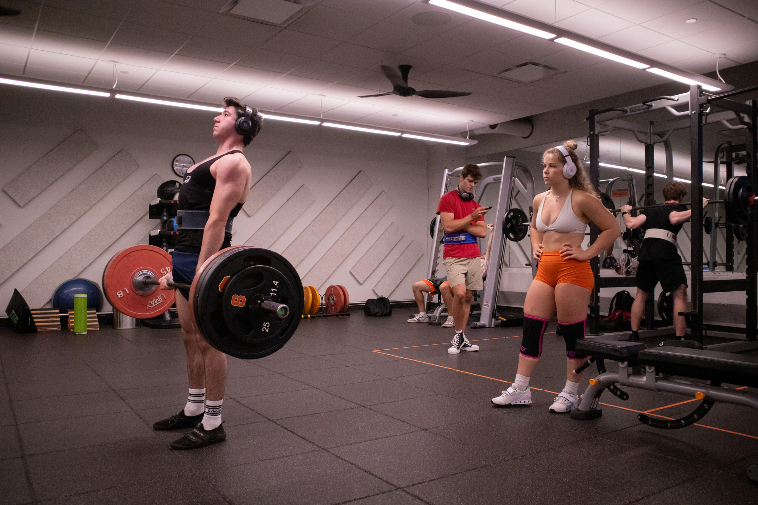 Orange Barbell lifting club aids growth in, out of the gym